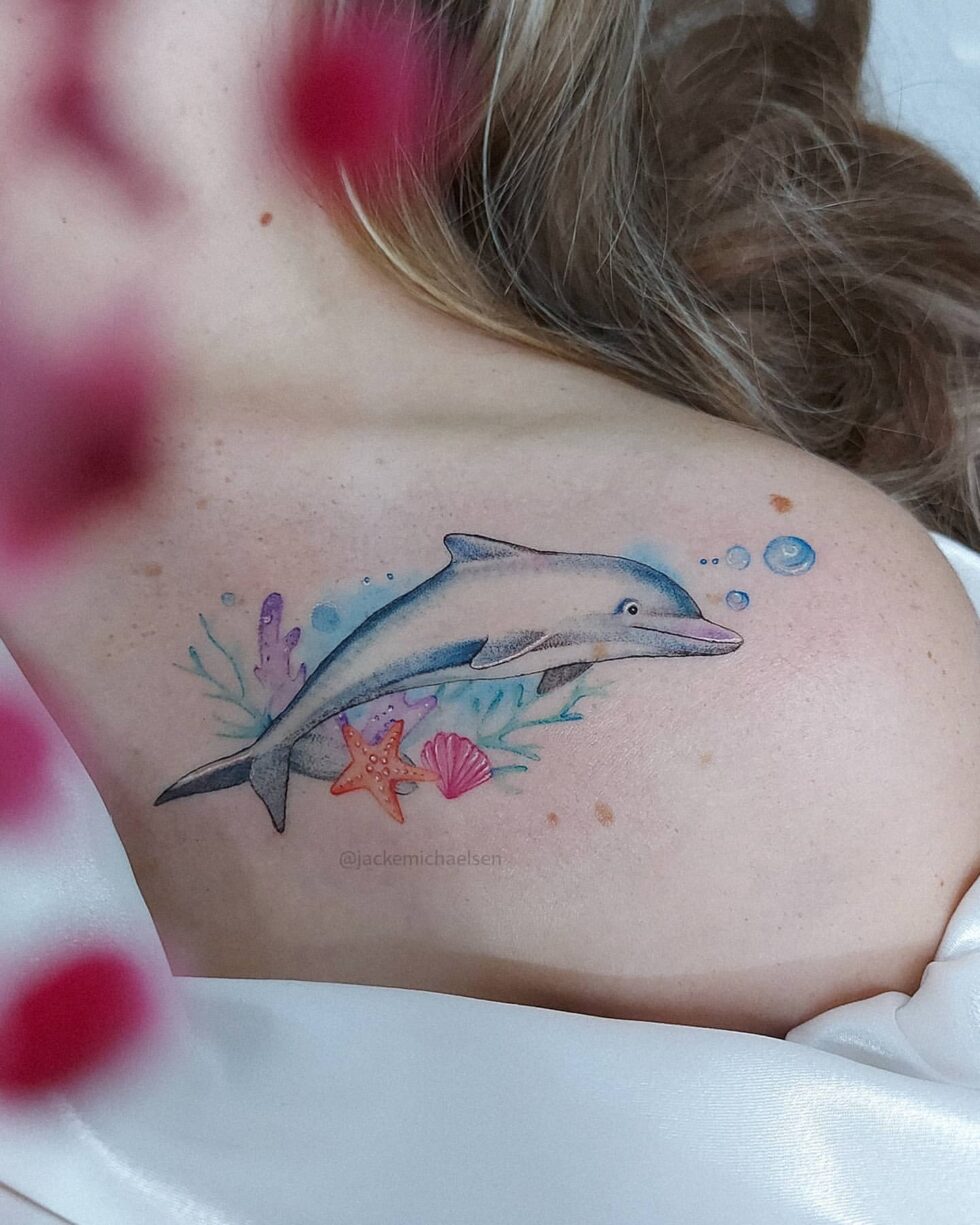 30 Delightful Dolphin Tattoo Ideas for Men & Women in 2024