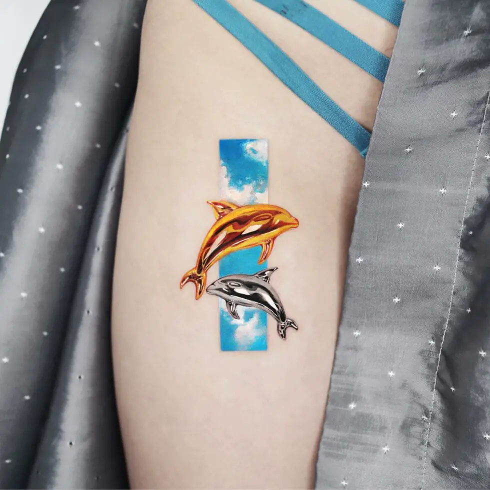30 Delightful Dolphin Tattoo Ideas for Men & Women in 2024