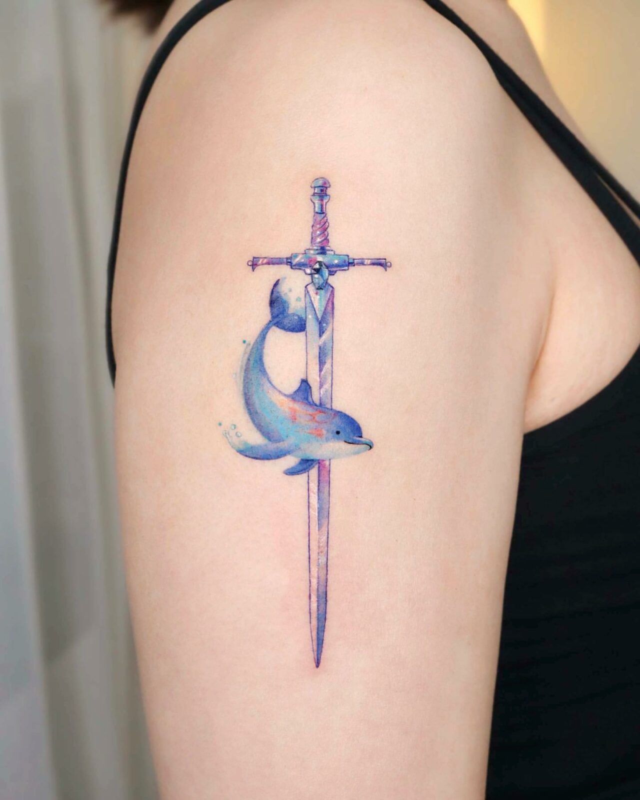 30 Delightful Dolphin Tattoo Ideas for Men & Women in 2024