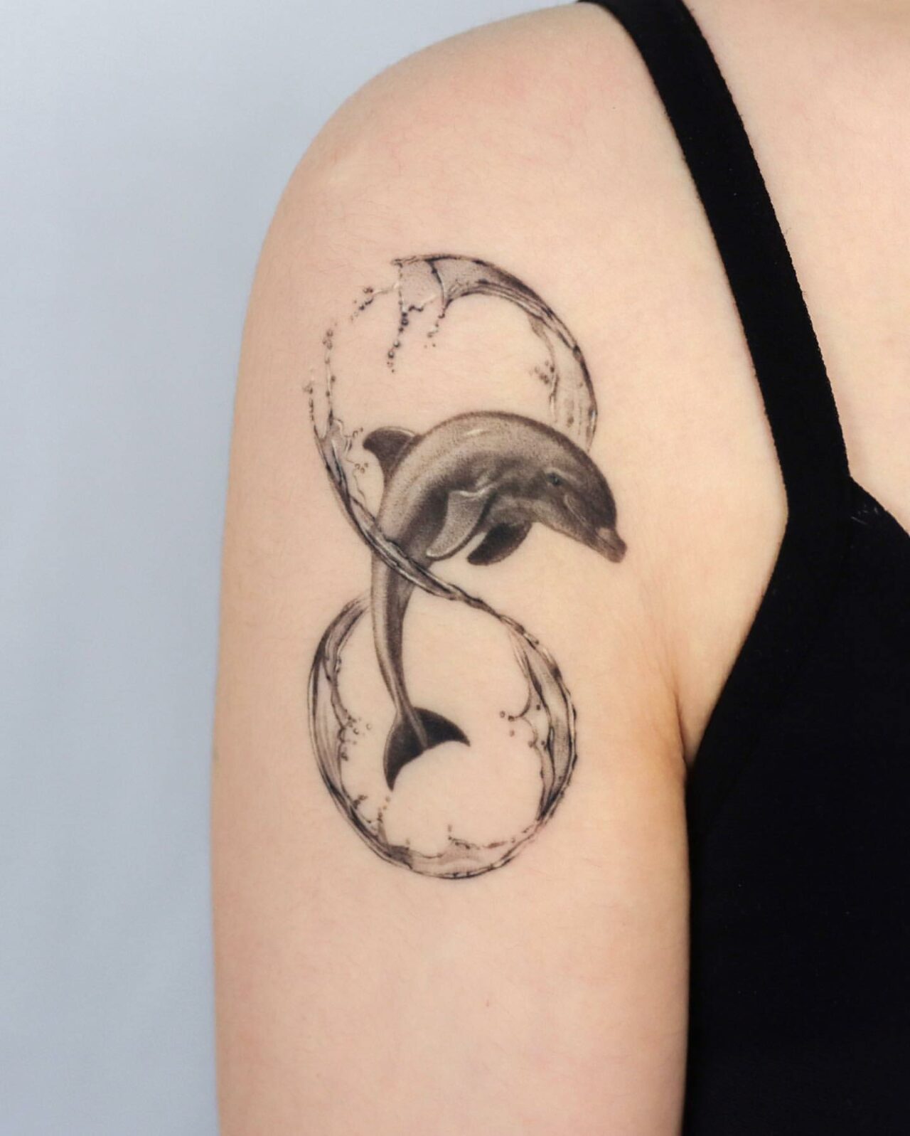 30 Delightful Dolphin Tattoo Ideas for Men & Women in 2024